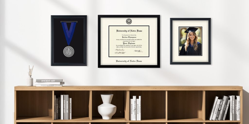 home library space with custom degree frame, medallion frmae, and photo ...